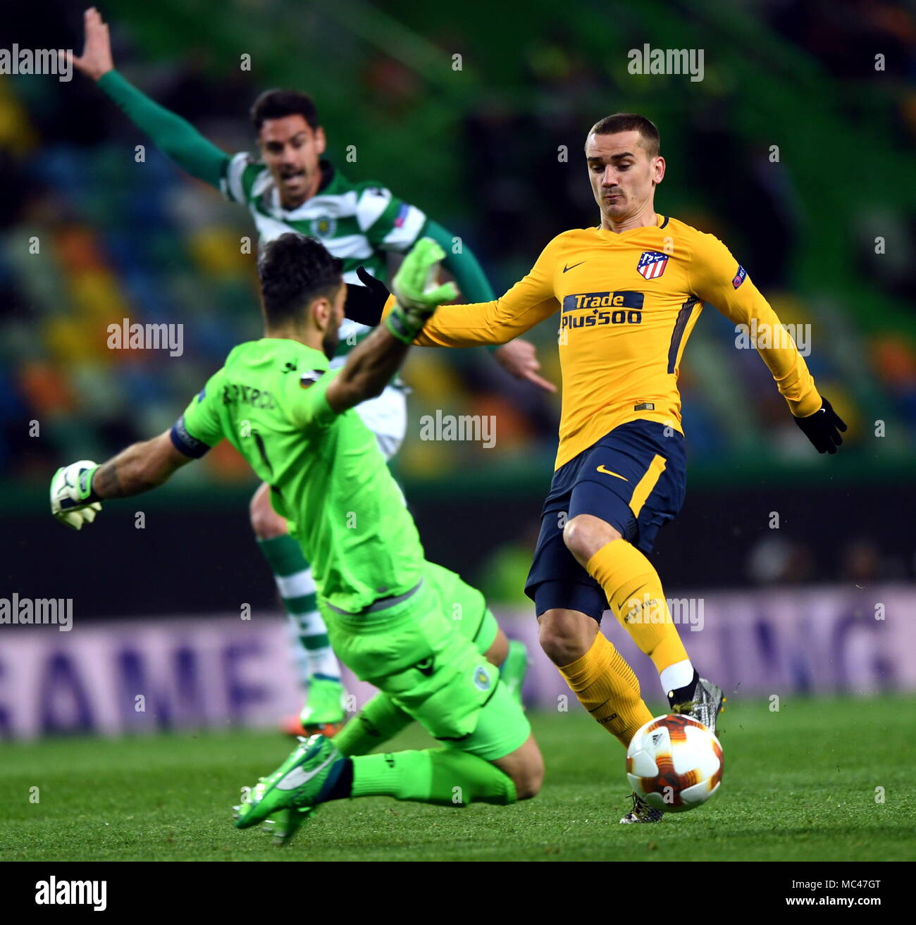 Lisbon, Portugal. 12th Apr, 2018. Antoine Griezmann (R) of Atletico ...
