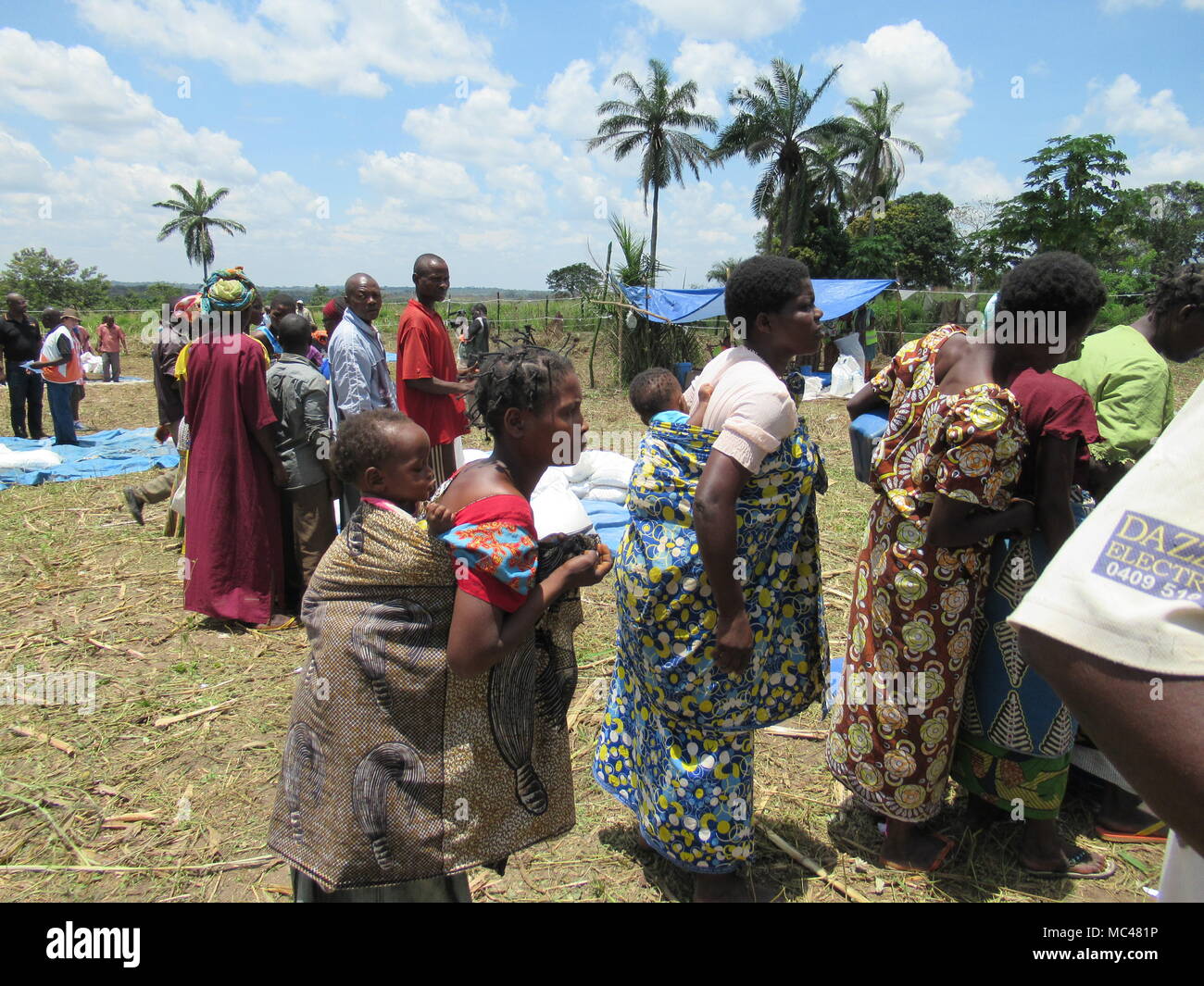 13 March 2018, Congo, Kananga: Mothers and babies wait in line for ...