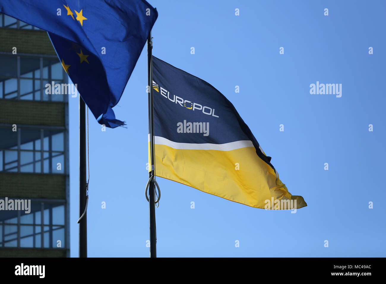 A flag of Europol flutter outside the Europol headquarters building in ...