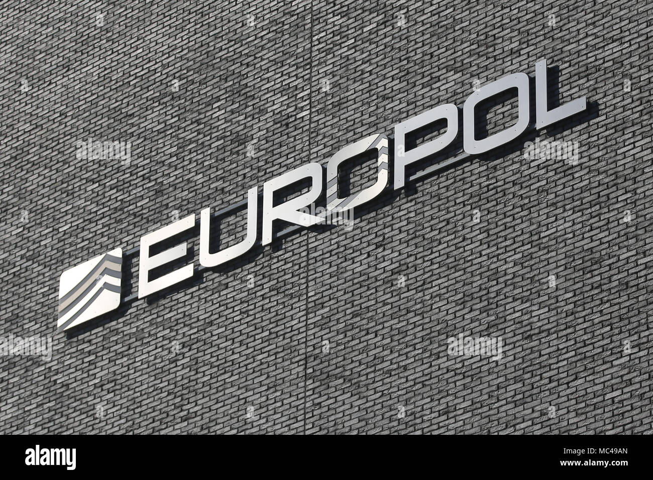 A logo of Europol is displayed on the Europol headquarters building in ...