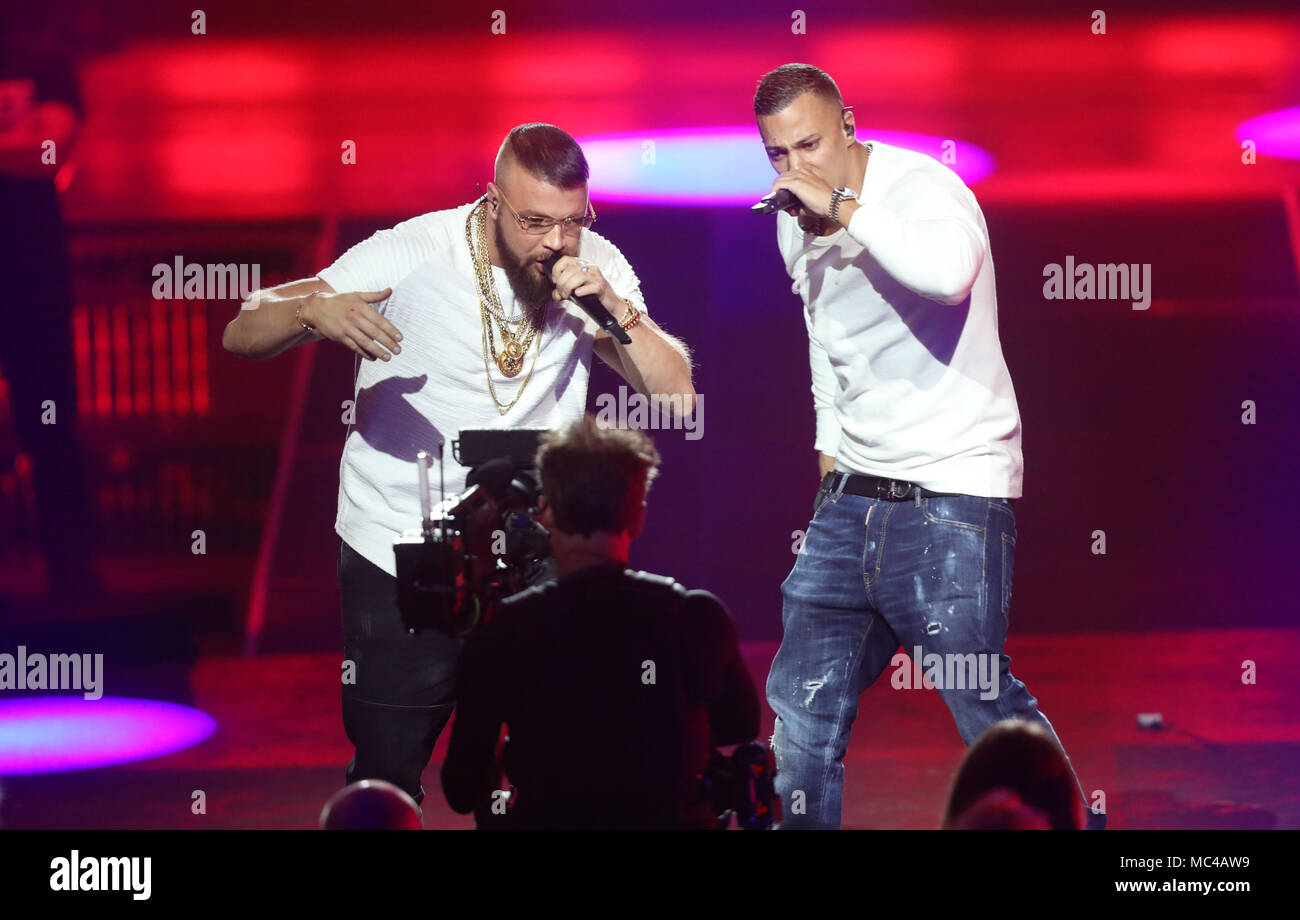 12 April 2018, Germany, Berlin: Rappers Kollegah (R) and Farid Band ...