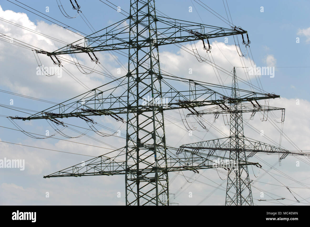 many high-voltage pylons for transporting electricity from a power ...