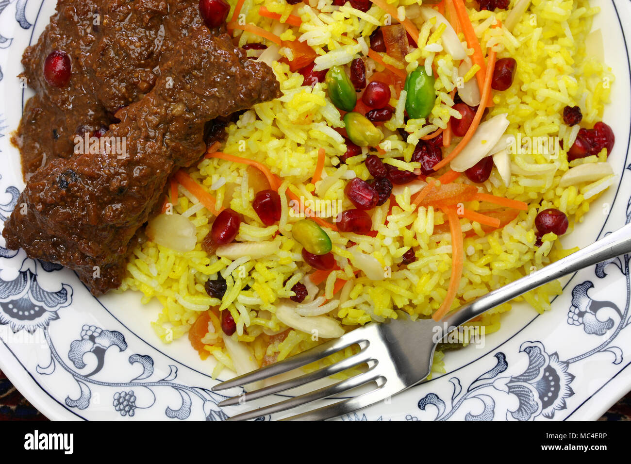 iranian cuisine, persian jeweled rice and chicken fesenjan Stock Photo ...