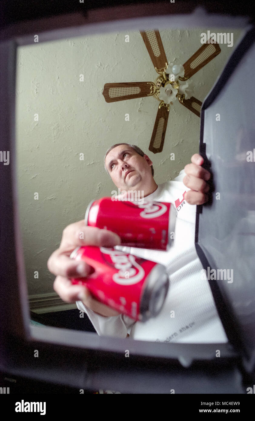 A man who was addicted to Coca-Cola, at one point drinking 60 cans per ...