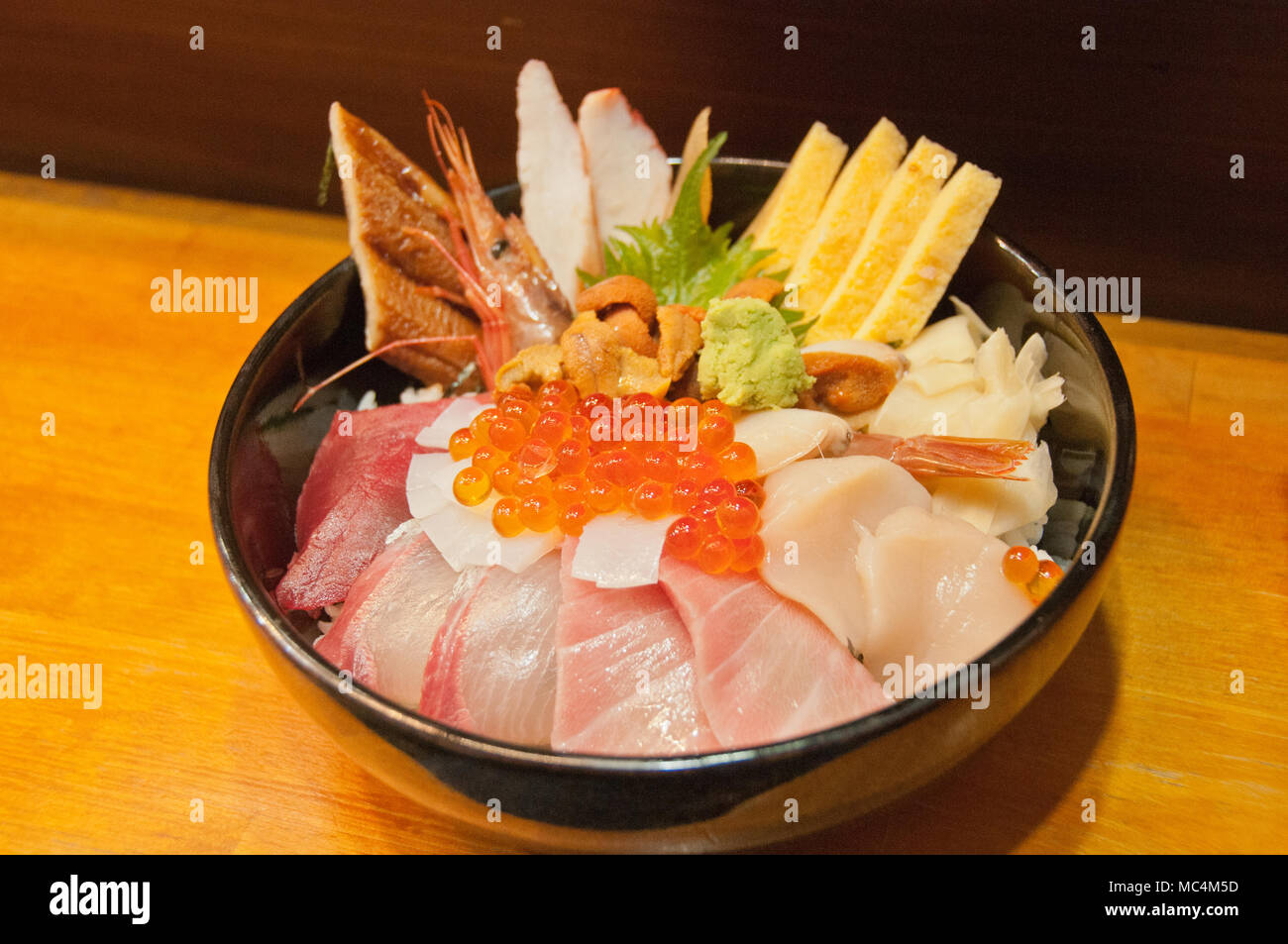 Full bowl of fresh Japanese seafood platter on rice Stock Photo - Alamy