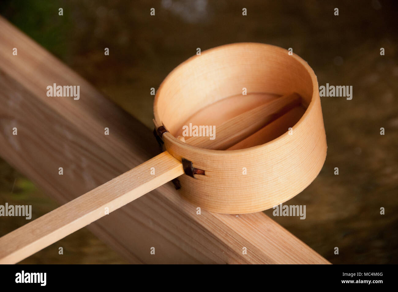 Wooden dipper of holy zen water in Japan Shinto temple Stock Photo - Alamy