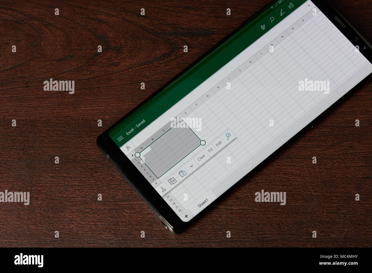 New york, USA - April 12, 2018: Using microsoft excel mobile close up ...