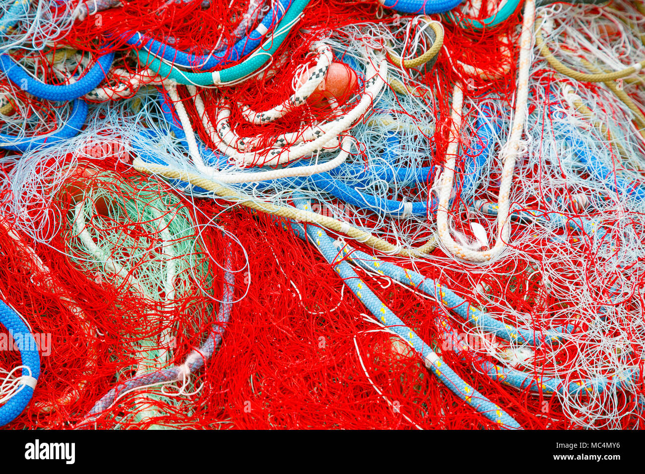 Commercial fishing nets nets close up, colorful texture Stock Photo - Alamy