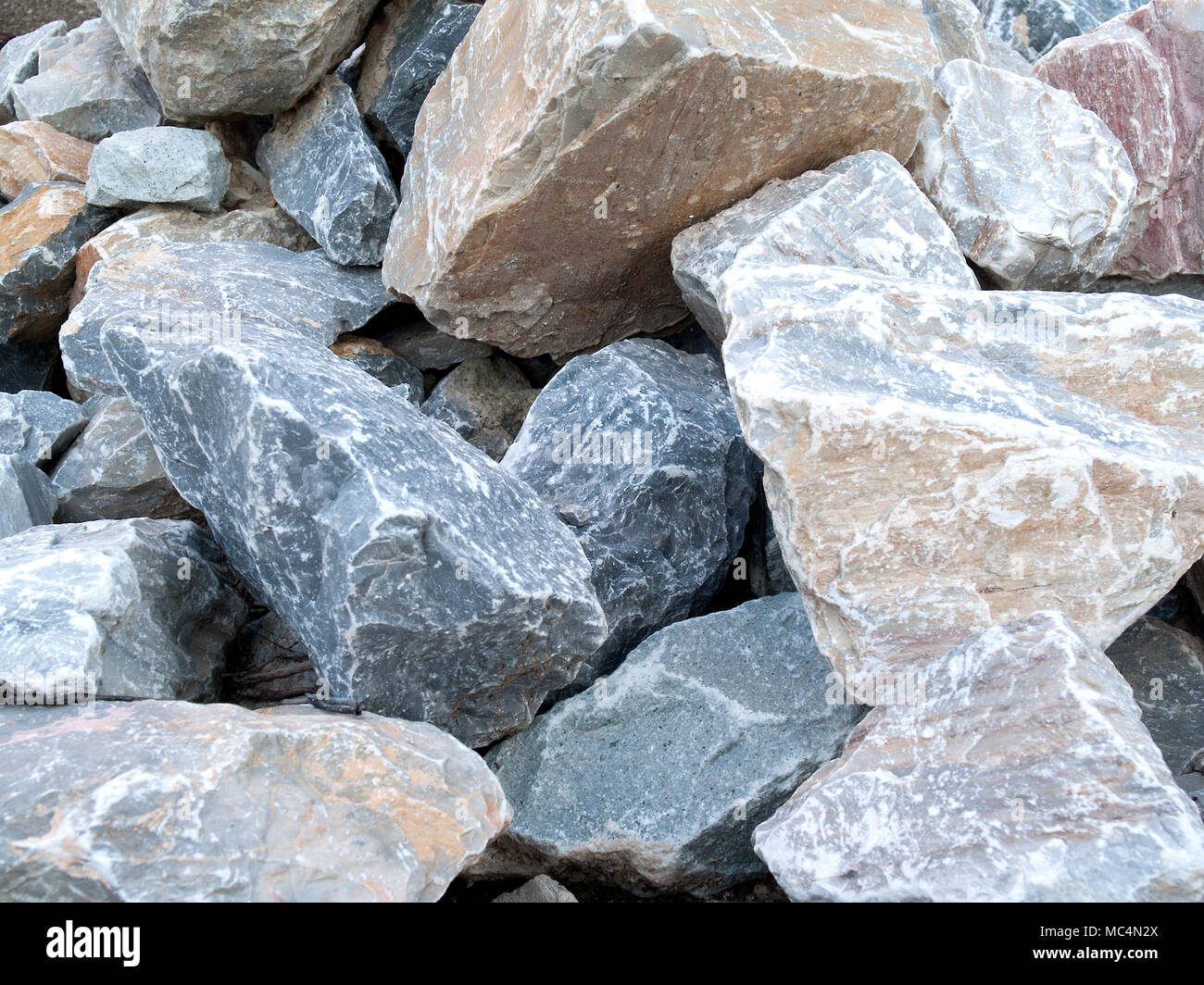 rock , Solid mass consisting of one or more types of ore together ...