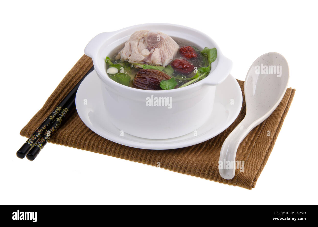 Chicken and herb soup in pot, Chinese food style Stock Photo - Alamy