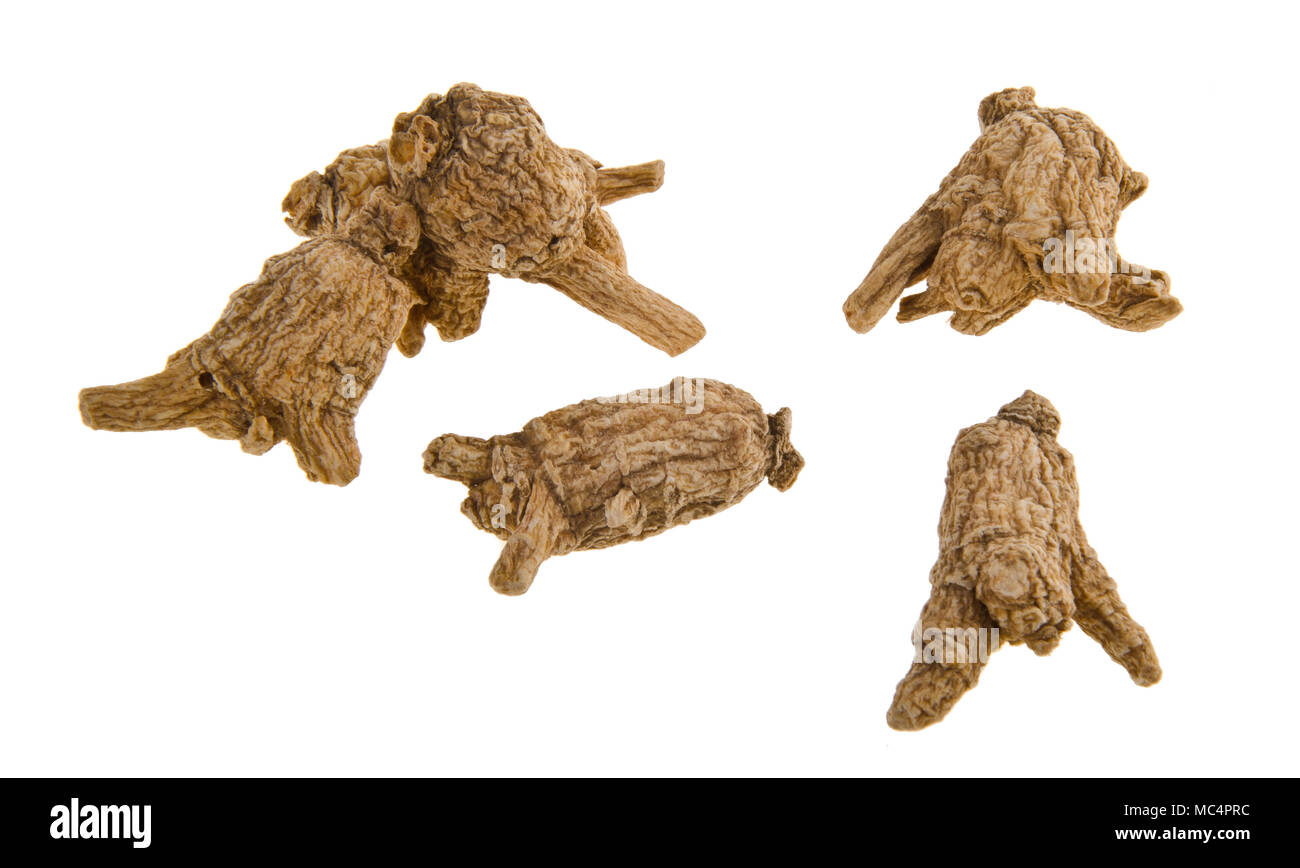 ginseng. Dried Ginseng On Background Stock Photo - Alamy