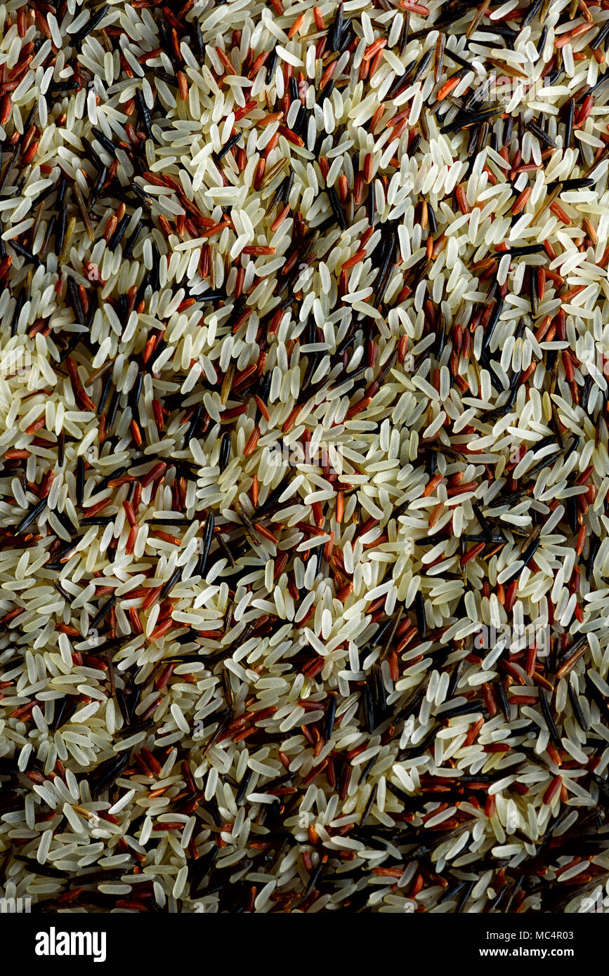 Raw organic rice berry and brown rice mixed texture. Food ingredient ...
