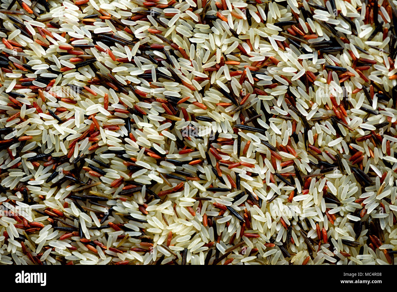 Raw organic rice berry and brown rice mixed texture. Food ingredient ...