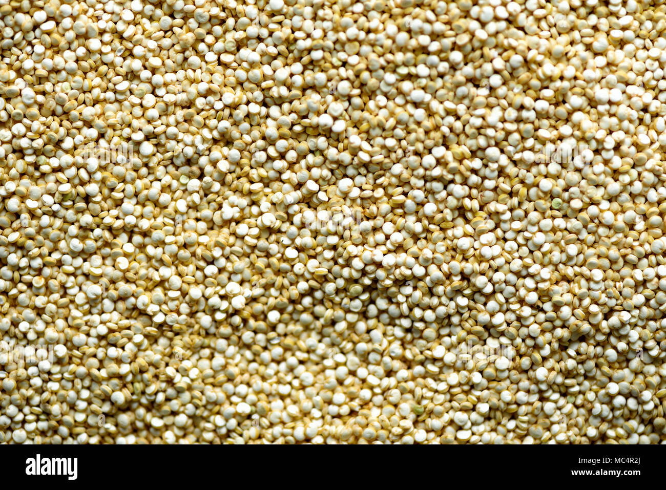 Raw organic quinoa grains background texture. Food ingredient ...