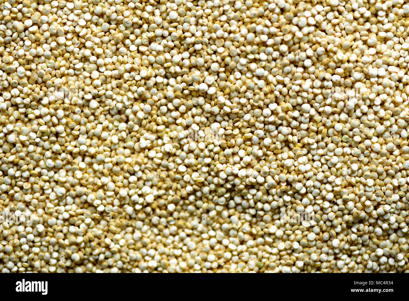Raw organic quinoa grains background texture. Food ingredient ...