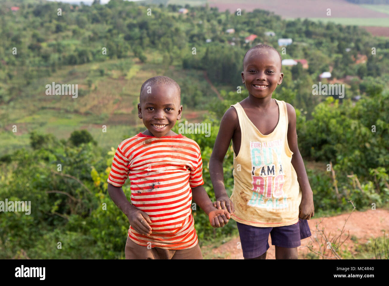 Lugazi, Uganda. June 18 2017. Smiling Ugandan boys standing on the top ...