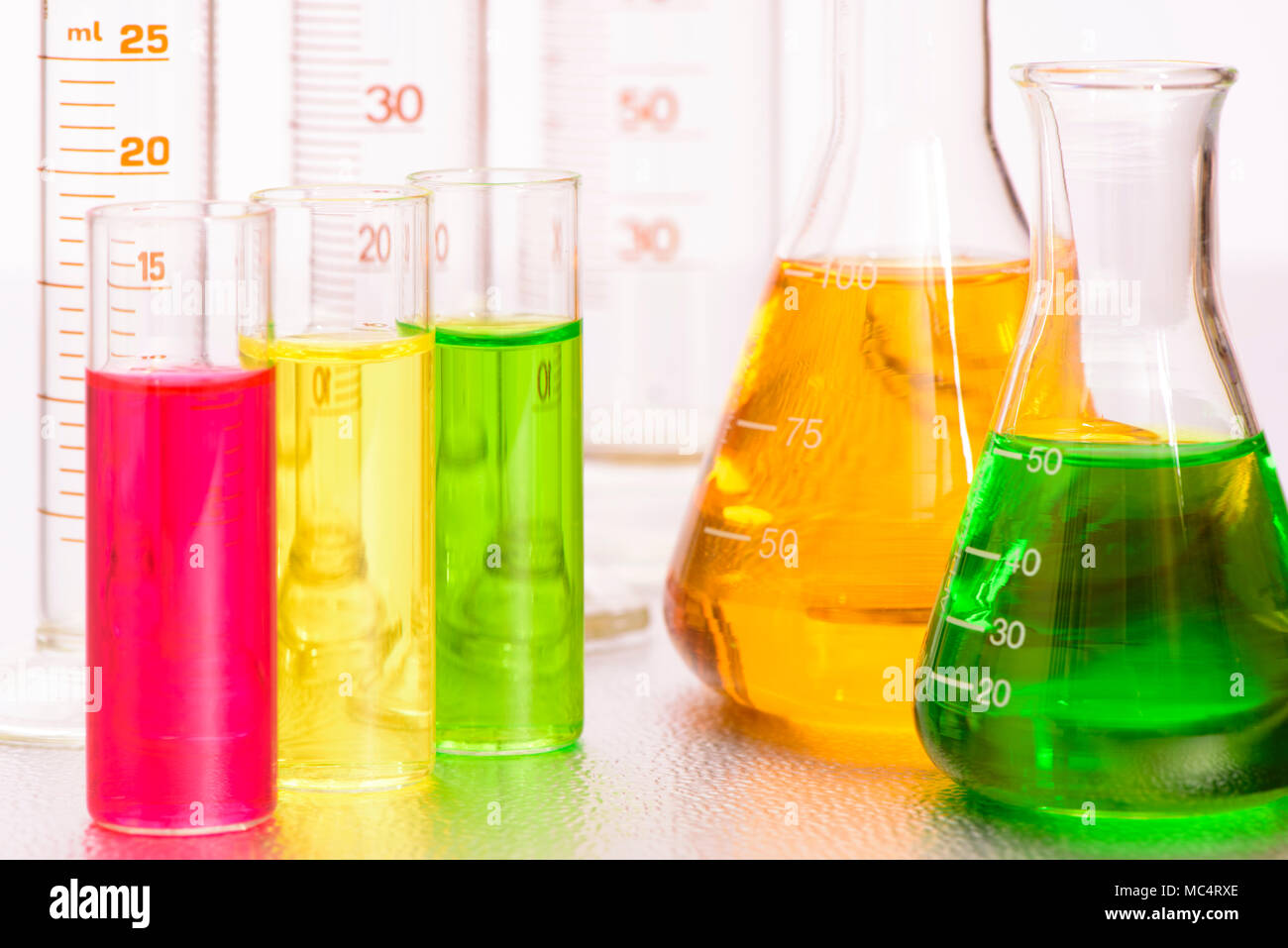 scientific experiment in chemistry laboratory with liquid in test tubes ...
