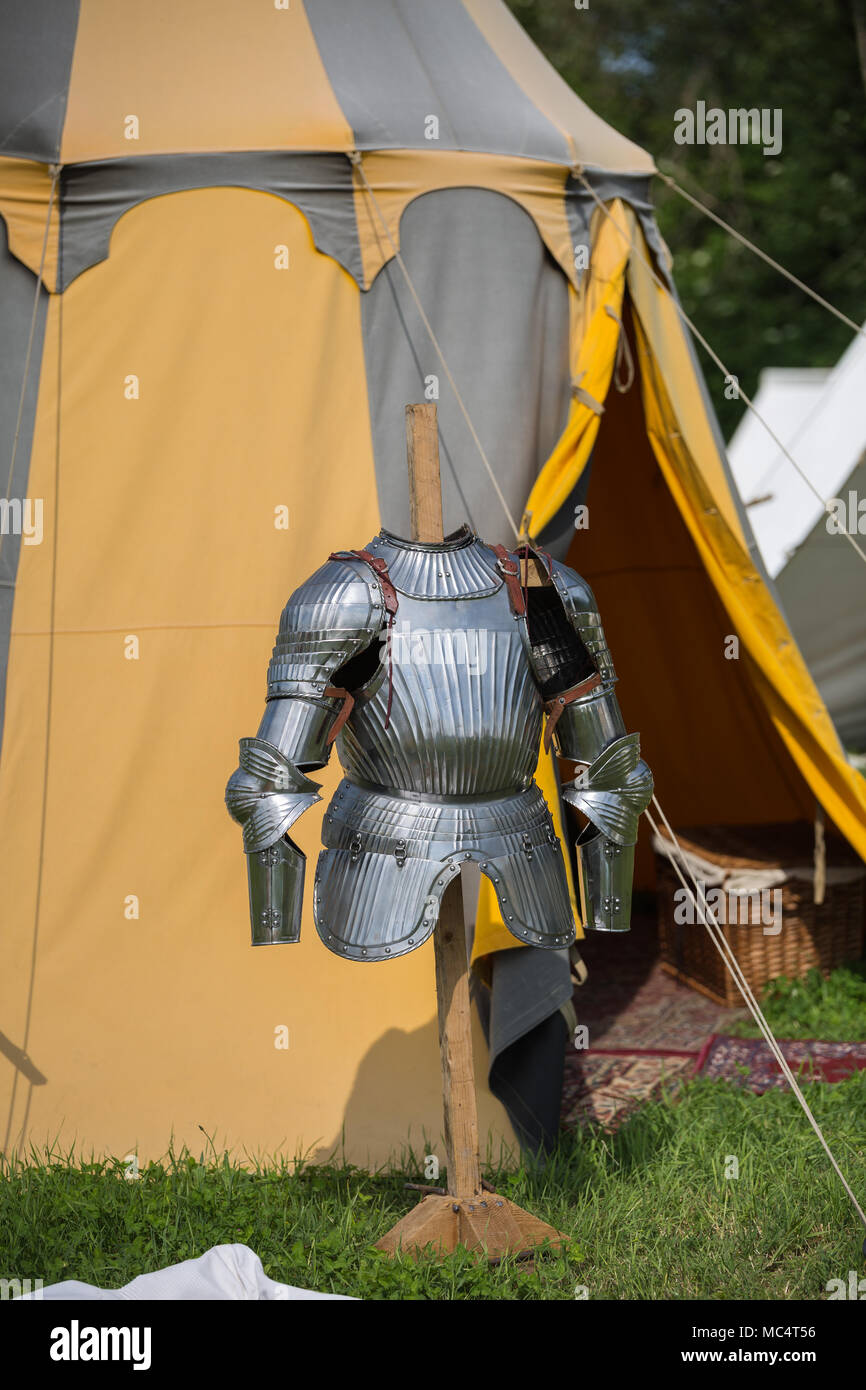 Medieval Metallic Armor and Ancient Tent in background Stock Photo - Alamy