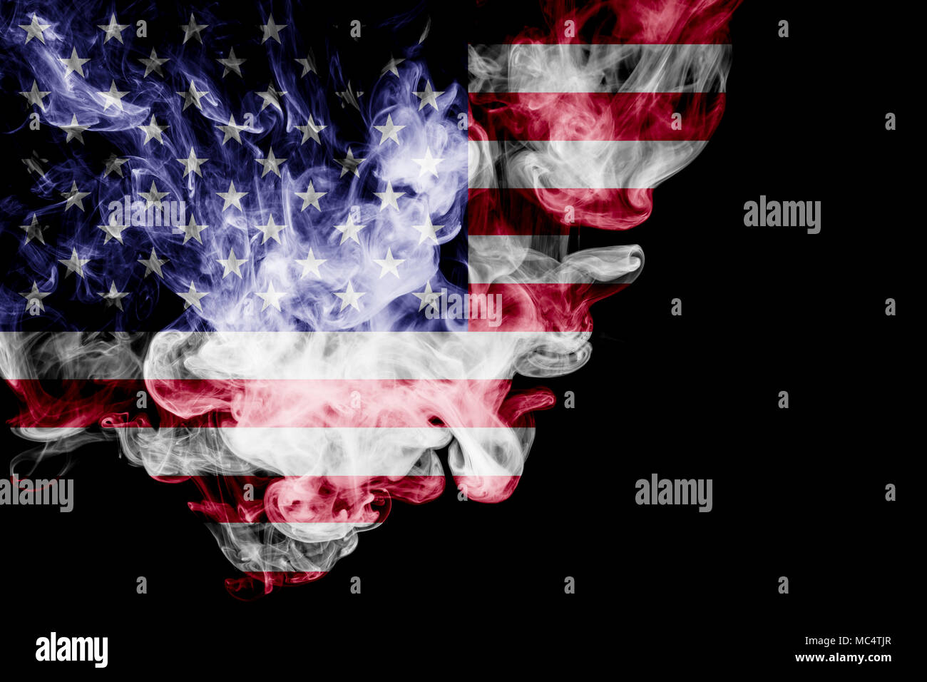 The national flag of the USA from dense colored smoke on a black ...