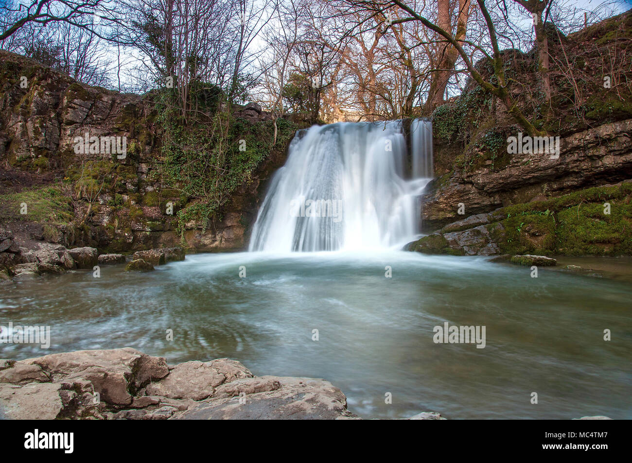 Water flowing over a waterfall at Janet's Foss in Yorkshire Stock Photo ...
