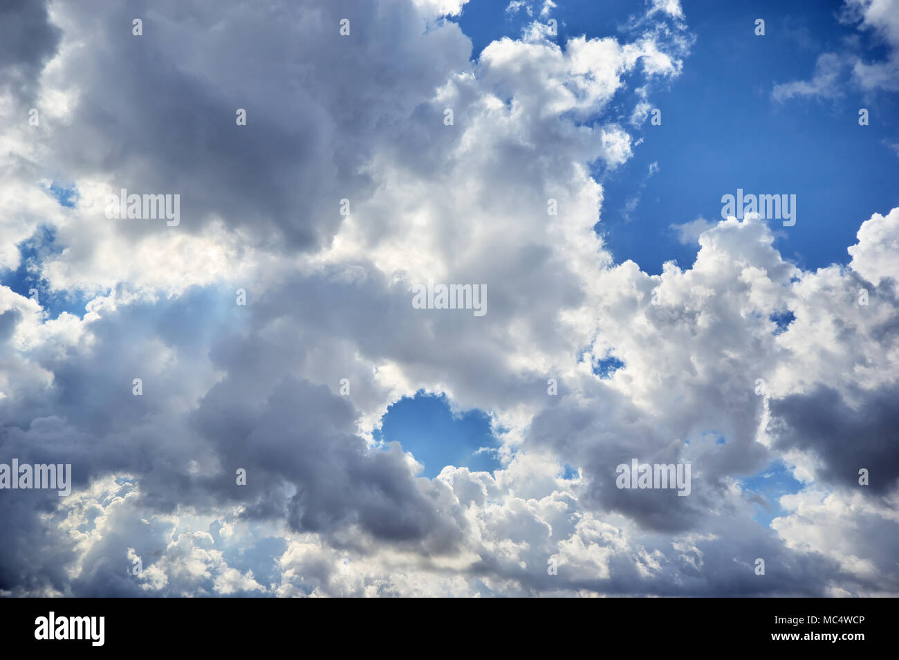 Deep blue sky with clouds at sunny day Stock Photo - Alamy