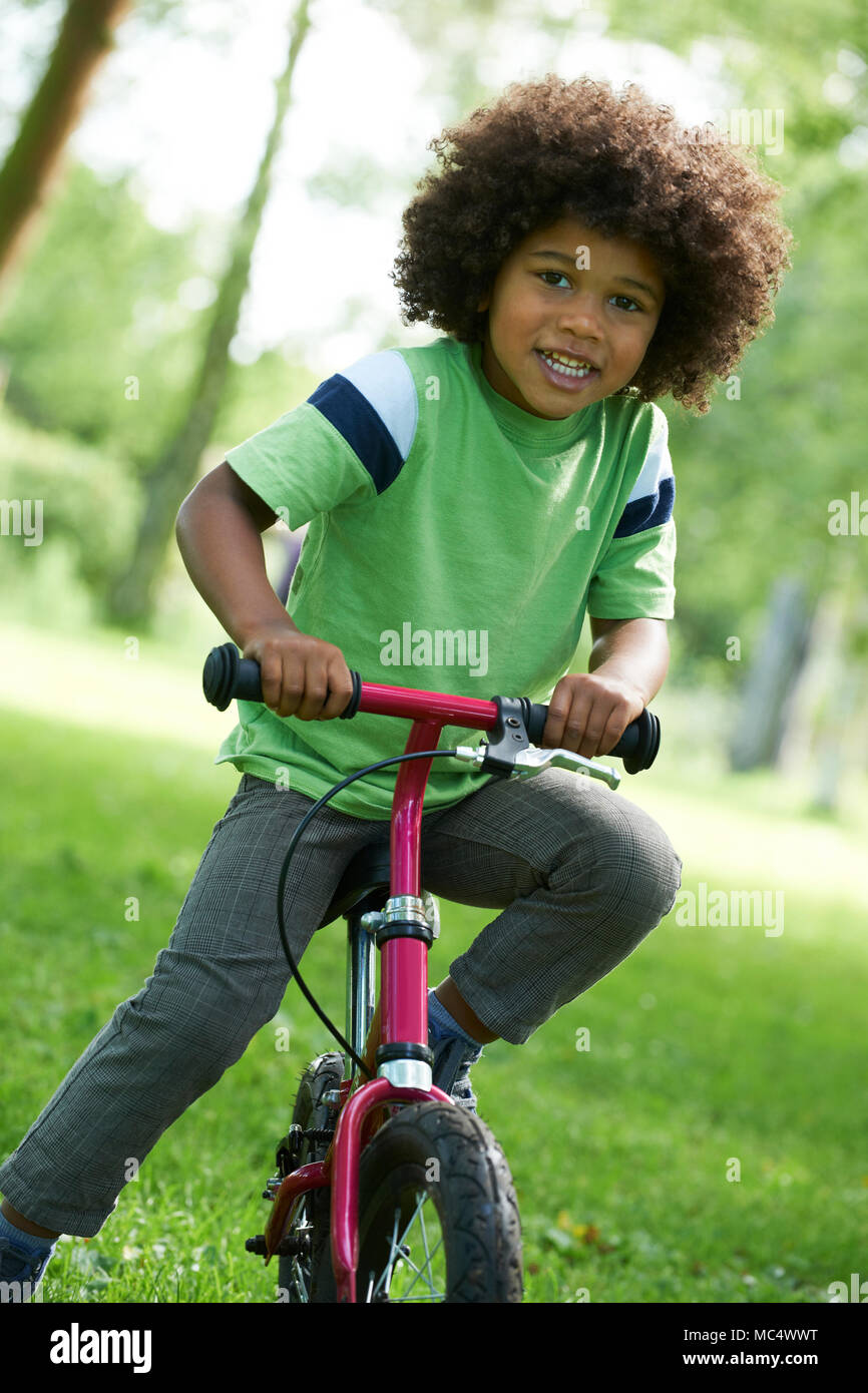 Children learning to cycle hi-res stock photography and images - Alamy