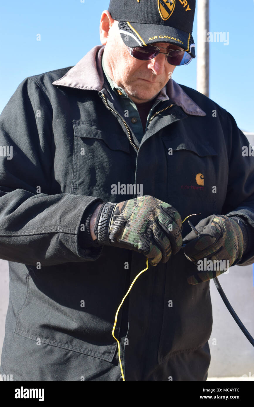 Crane Army Ammunition Activity workers burn aircraft flares to ensure ...