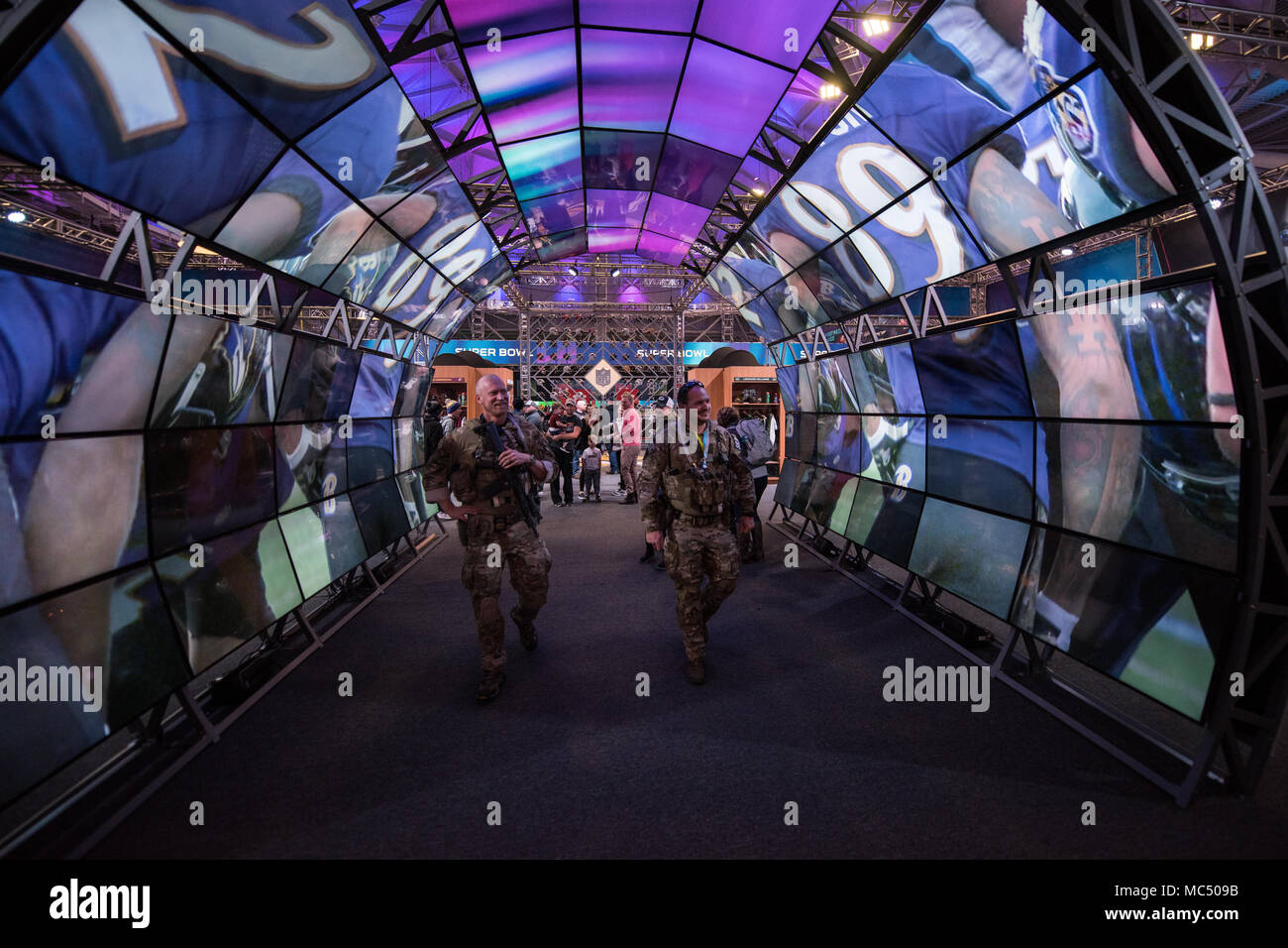 Two SRT members patrol the Super Bowl Experience. SRTs are trained to ...