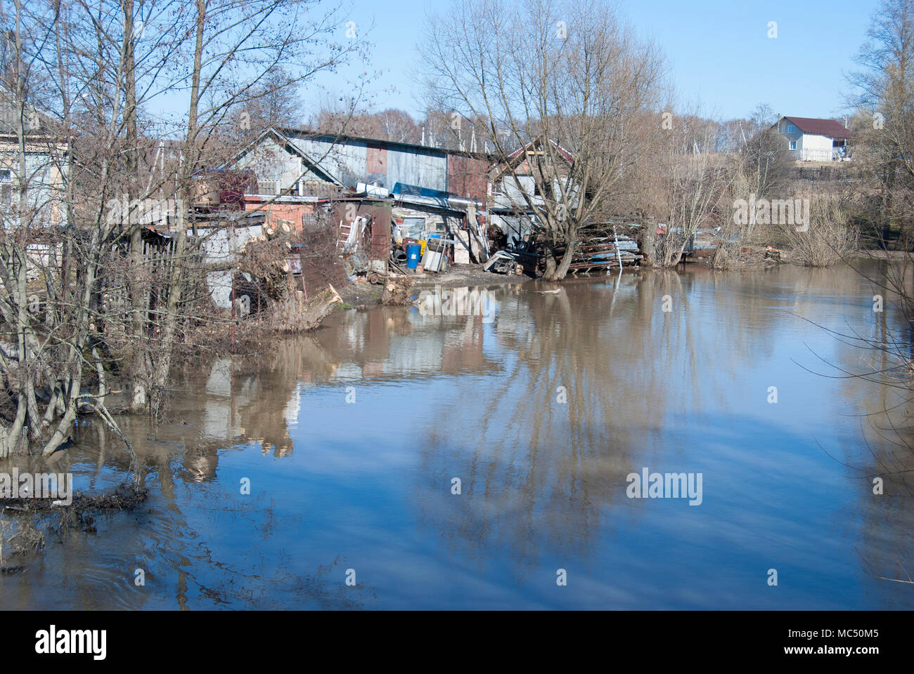 The river begins to flood in the spring, flooding the banks. Flooding ...