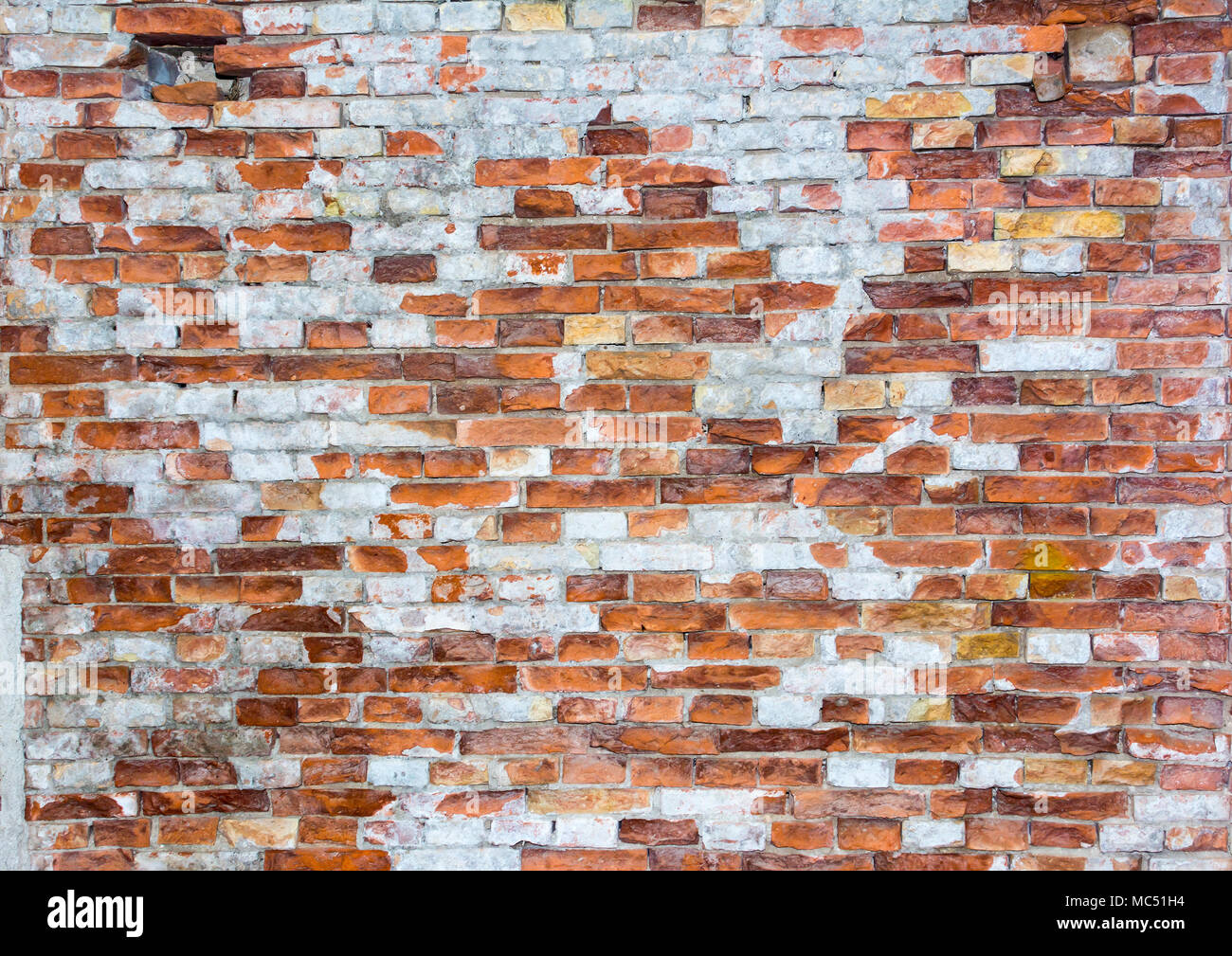 Weathered brick wall Stock Photo - Alamy