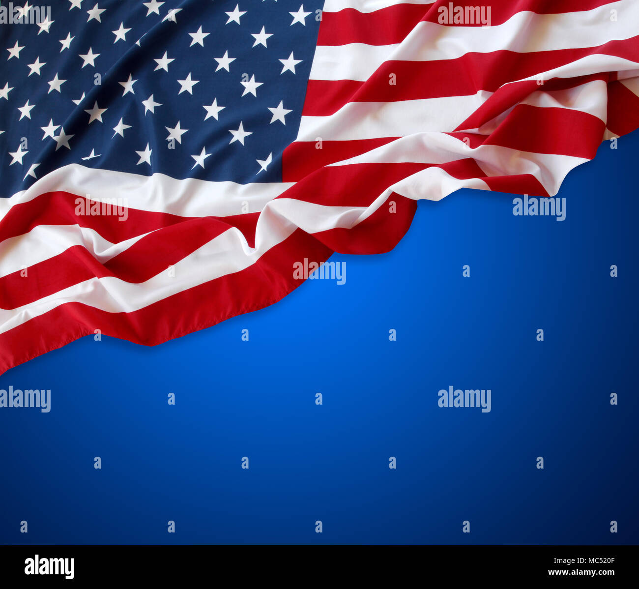 American flag on blue background Stock Photo - Alamy