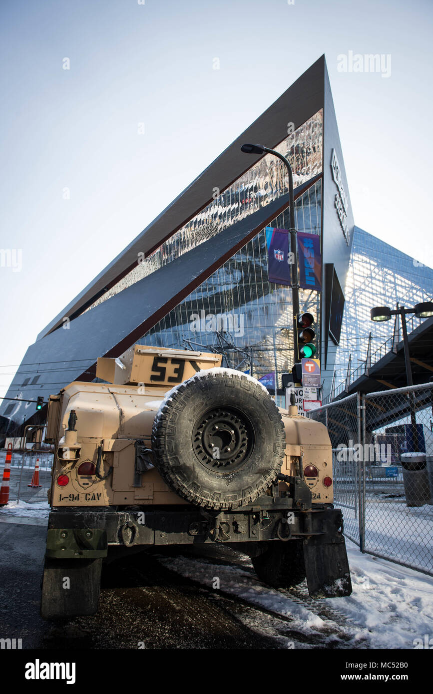 Minnesota Army National Guard Humvee is parked at an entrance of the U ...