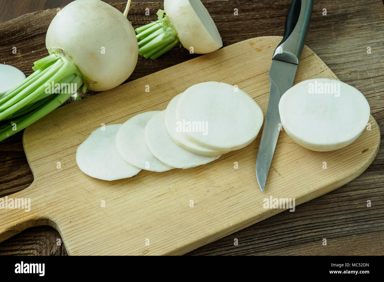 Sliced daikon radish.Tasty fresh crude white round japanese radish ...