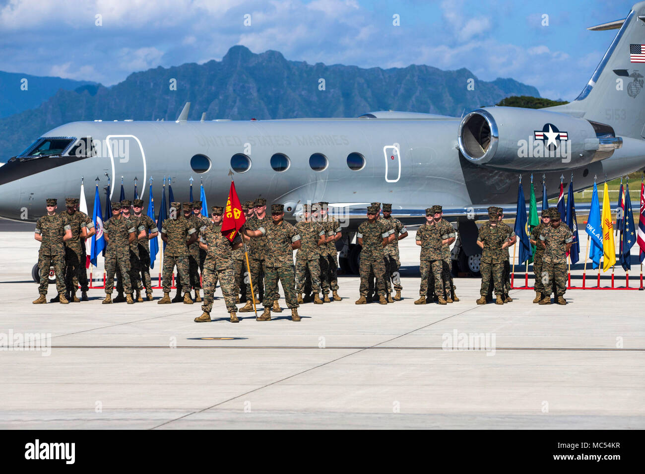 U.S. Marines with Marine Corps Air Station (MCAS) Kaneohe Bay, stand in ...