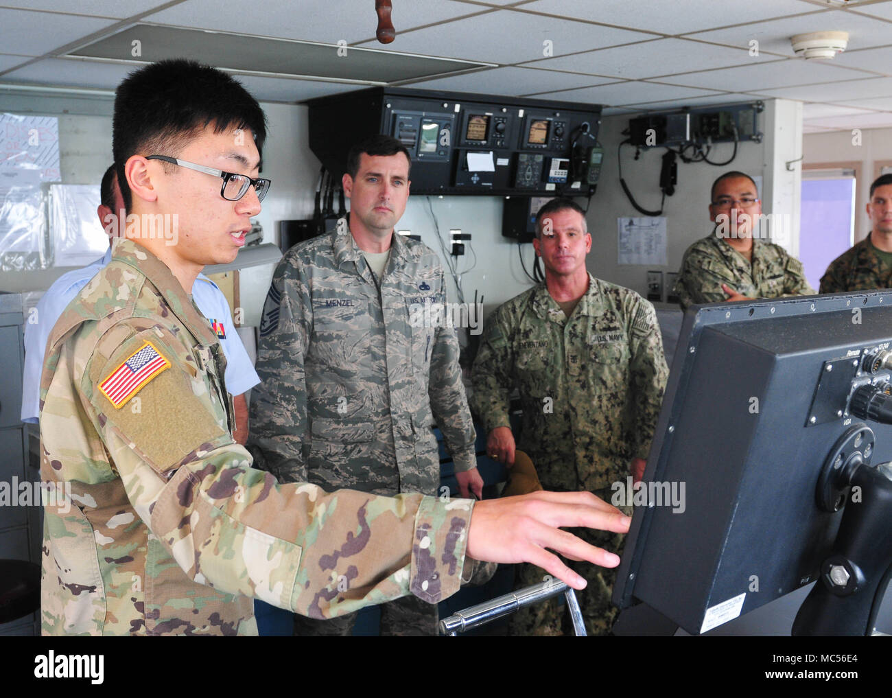 Spc. Yulin Ge, a watercraft operator with the 545th Transportation ...