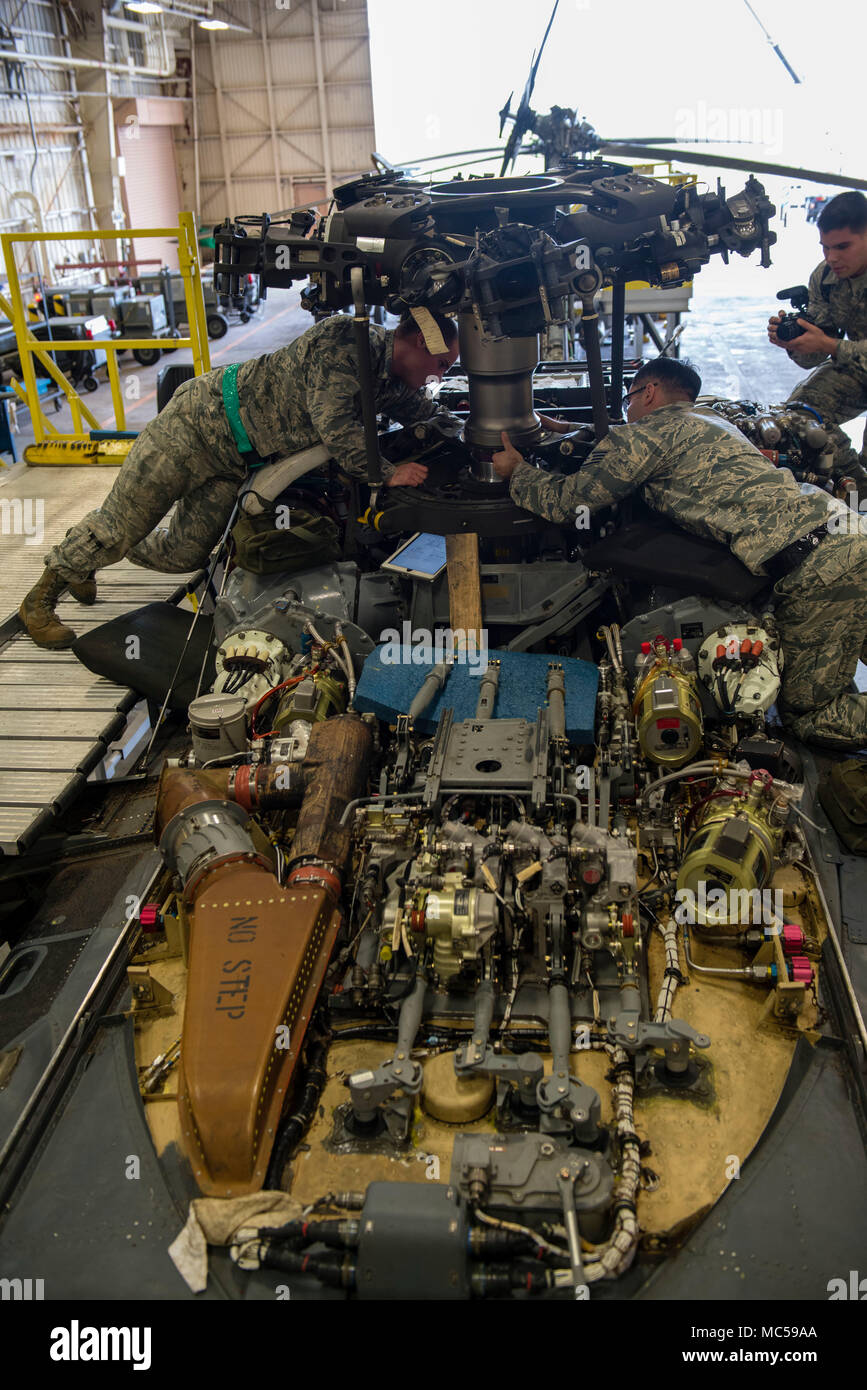A U.S. Air Force HH-60G Pavehawk crew chiefs from the 33rd Helicopter ...