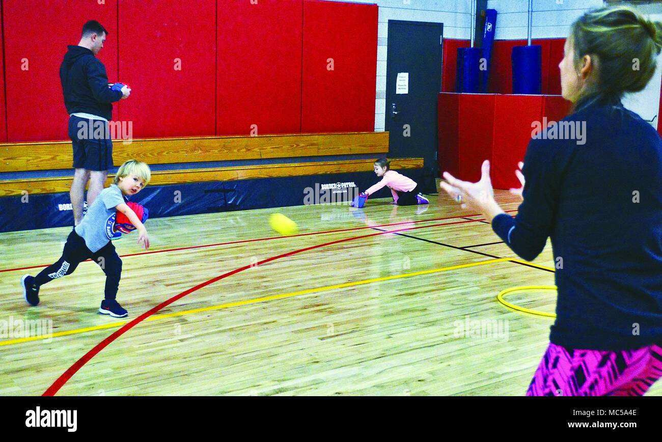 A child plays catch with his mom. (Photo by Jeremy Beale Stock Photo ...