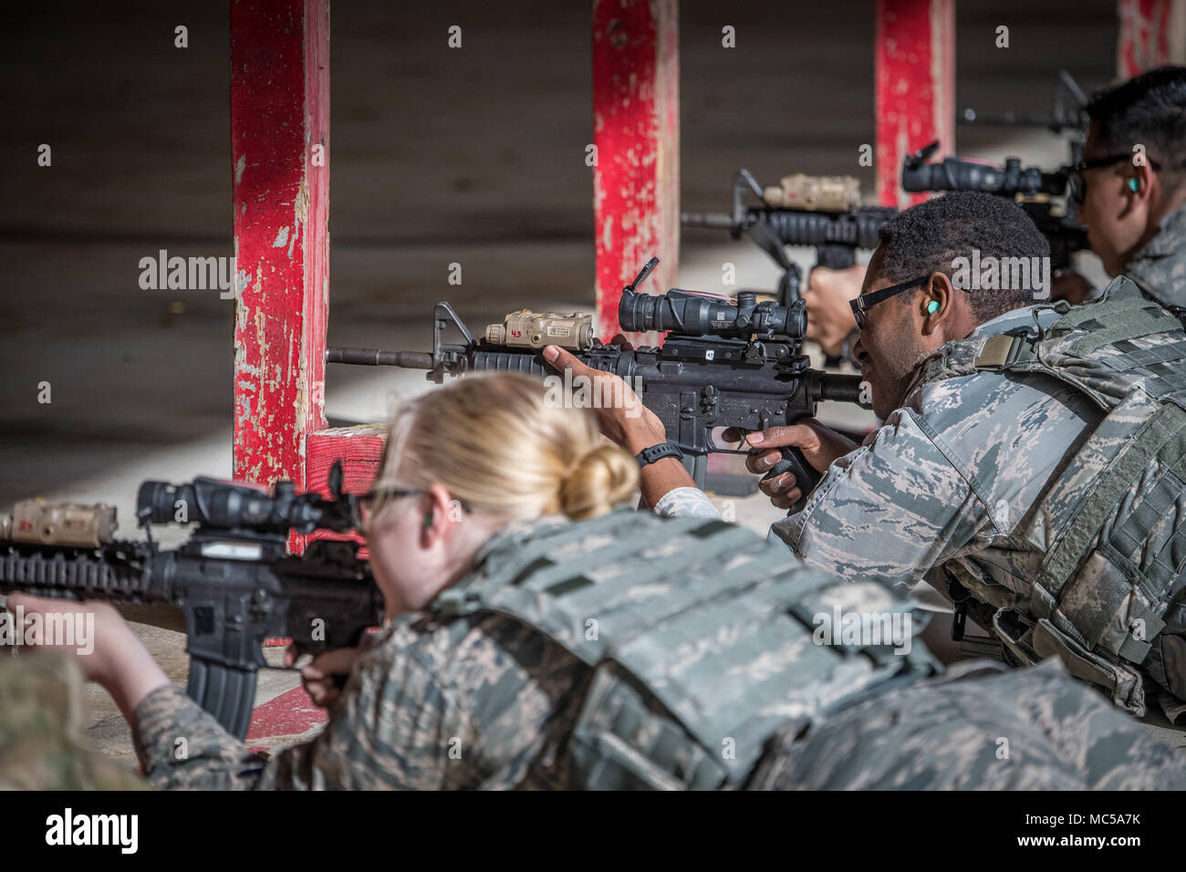 Airmen assigned to the 2nd Security Forces Squadron, perform an annual ...