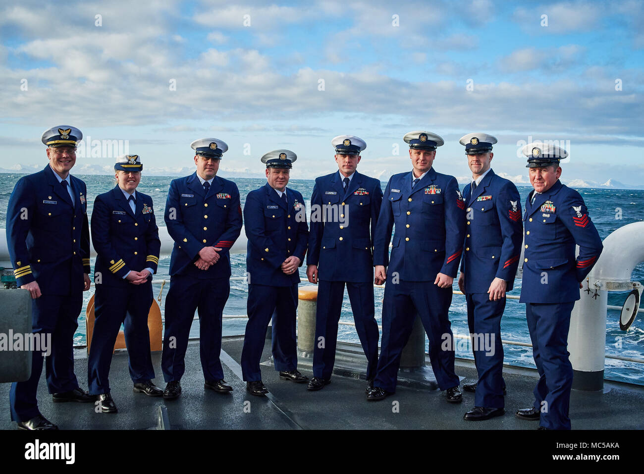Members aboard the Coast Guard Cutter SPAR conduct a burial at sea near ...