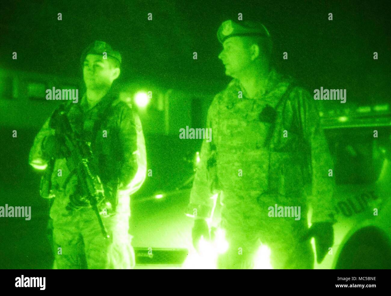 U.S. Air Force Airman 1st Class Daniel Regan, left, 86th Security ...