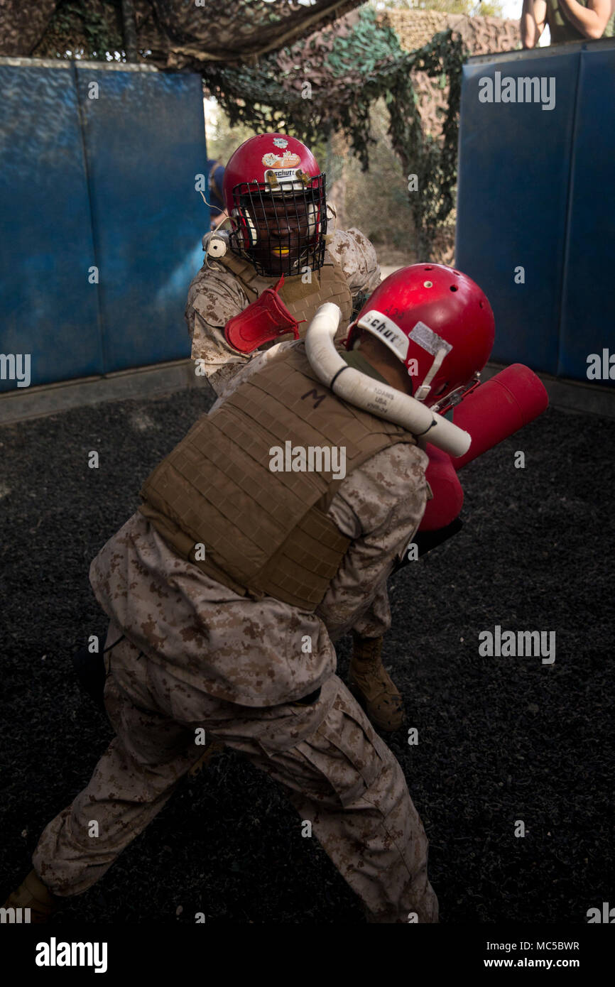 Recruits with Kilo Company, 3rd Recruit Training Battalion, conduct a pugil sticks bout at ...