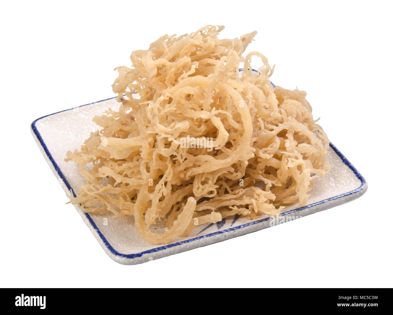 seaweed. Edible seaweed salad on white background Close-up Stock Photo ...