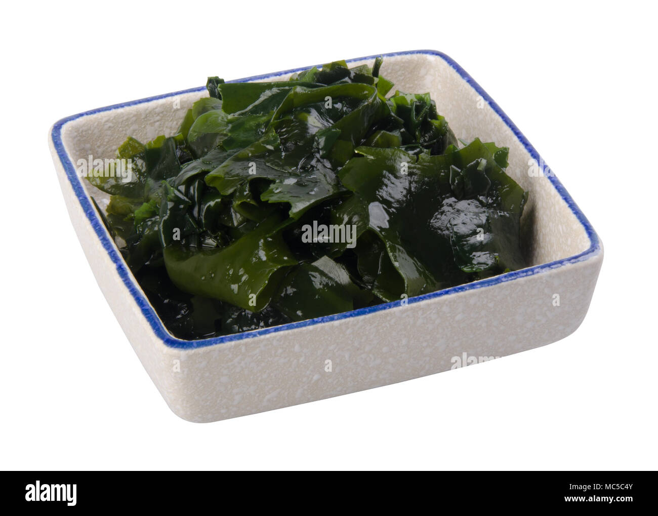 seaweed. Edible seaweed salad on white background Close-up Stock Photo ...