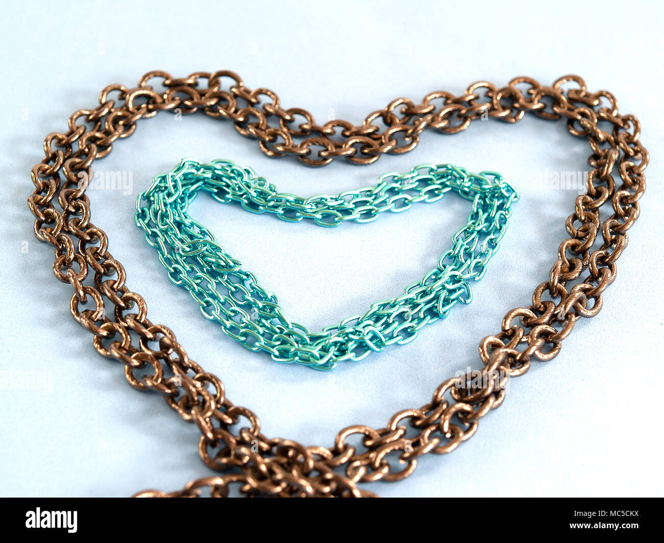 To bind together and form the heart with love Stock Photo - Alamy