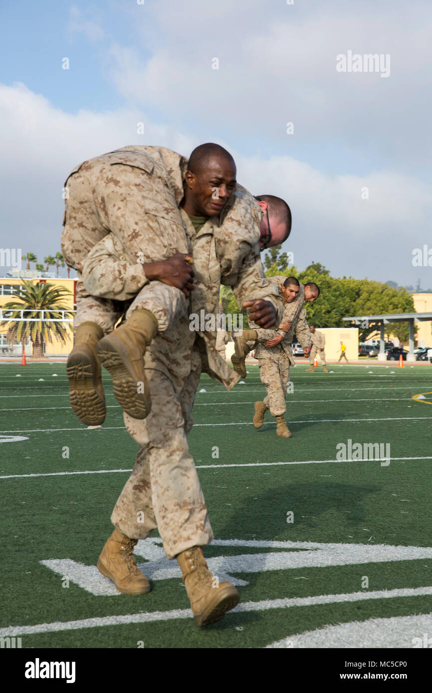 Firemans carry hi-res stock photography and images - Alamy