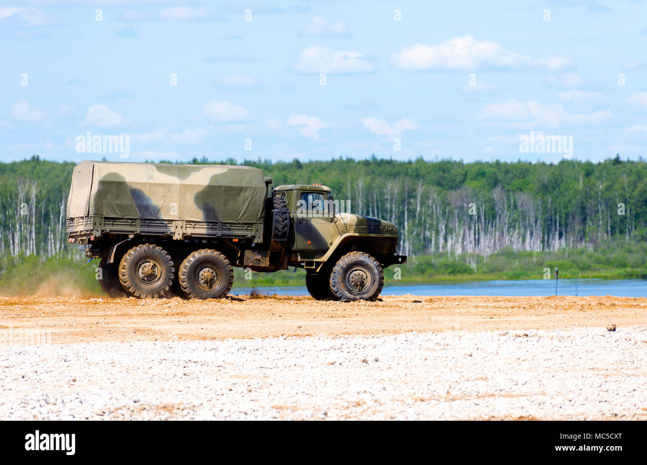 Driving car on dusty road hi-res stock photography and images - Alamy