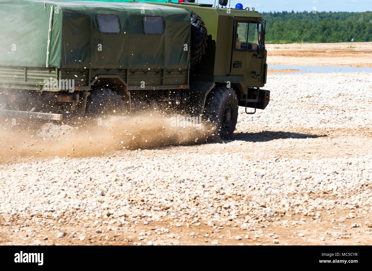 Driving car on dusty road hi-res stock photography and images - Alamy