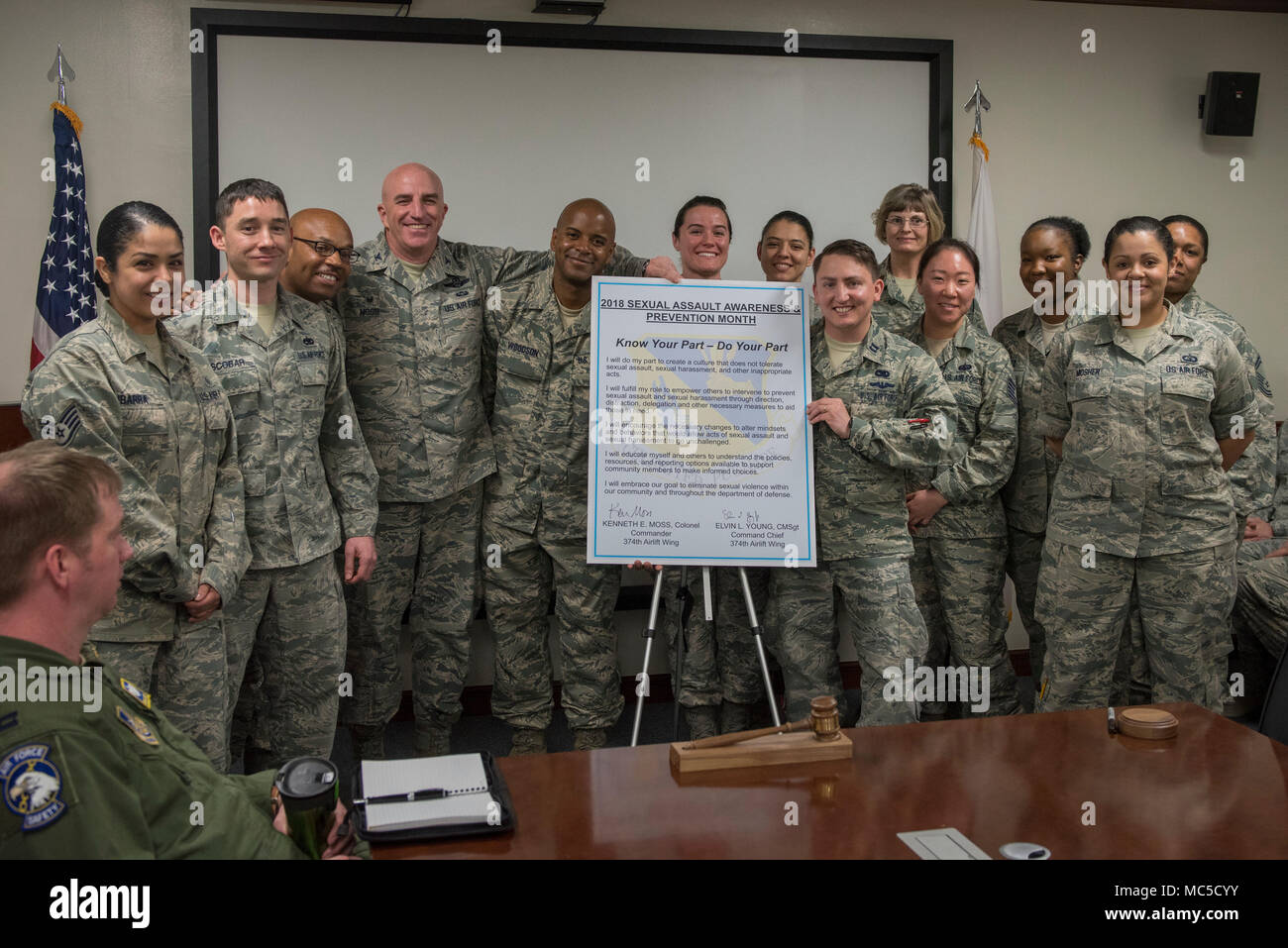 Col. Kenneth E. Moss, 374th Airlift Wing commander, and Chief Master ...
