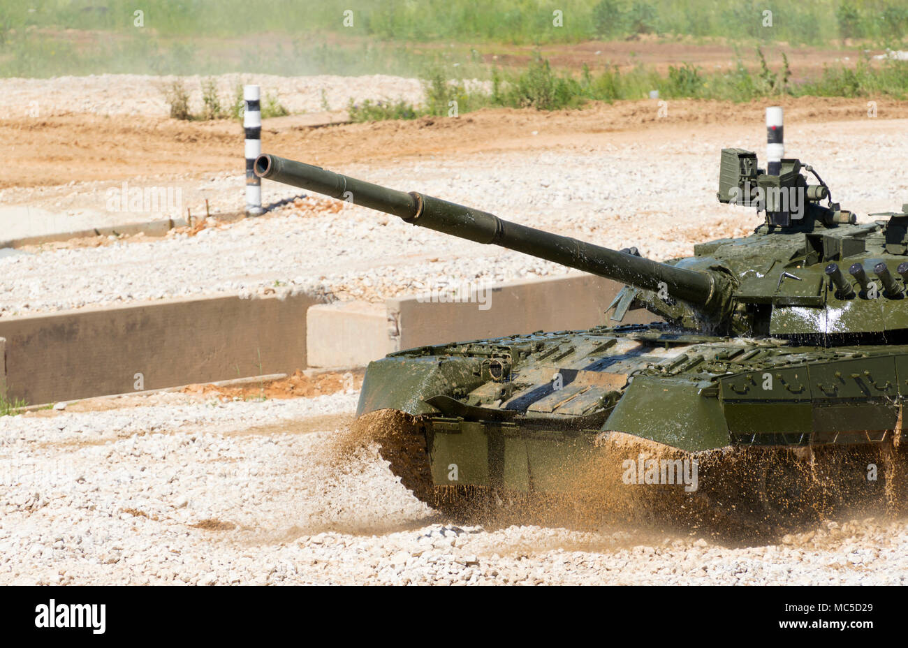 Tank on a field. Modern military equipment Stock Photo - Alamy