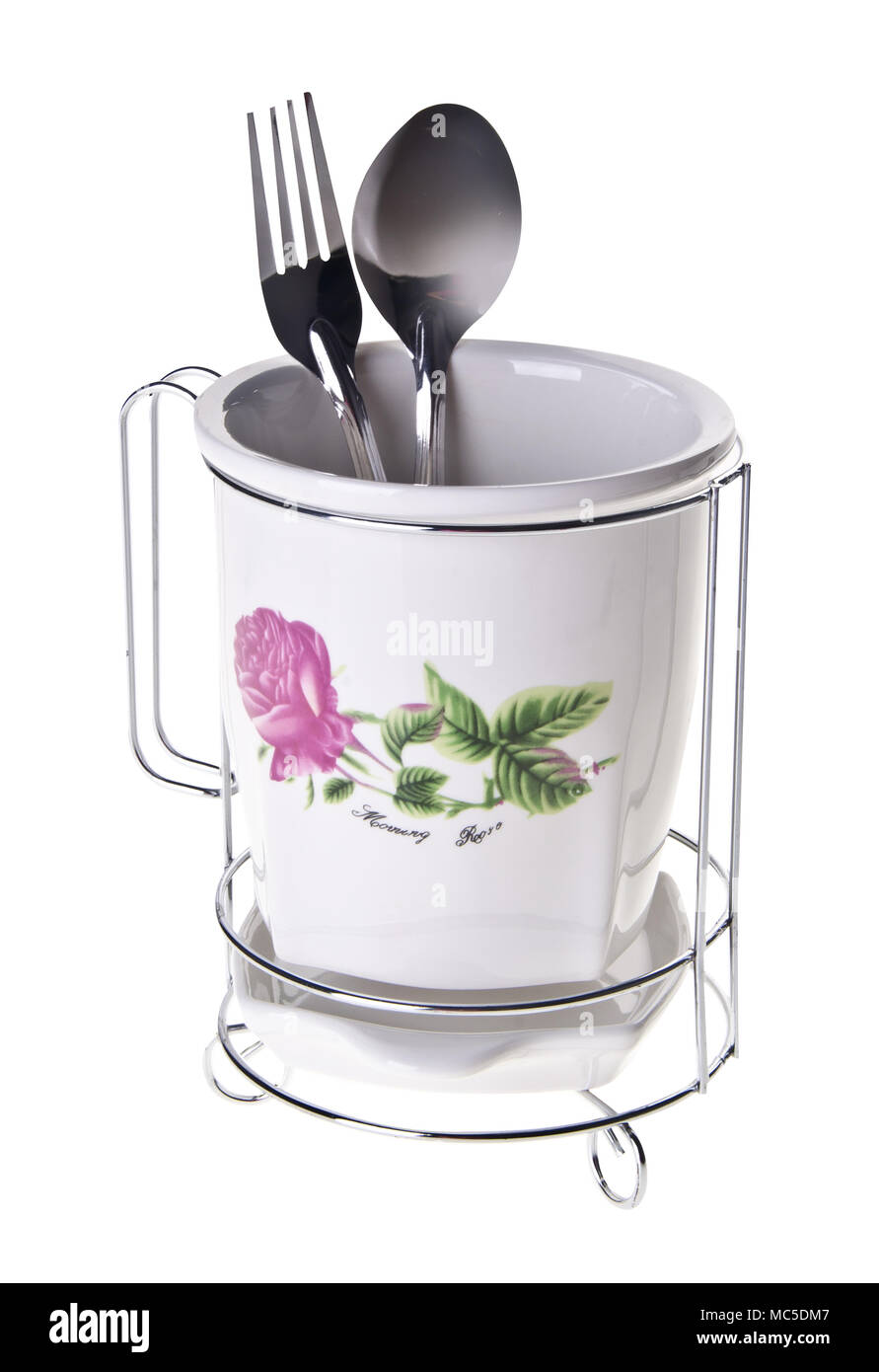 Kitchen utensils holder on the background Stock Photo - Alamy